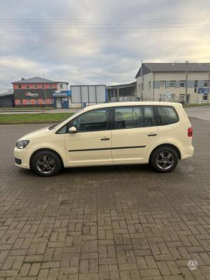 Yellow Volkswagen Touran 2016 in Pasvalys, with an engine capacity of 1.97 L and mileage of 311 thousand km for 4650 €, photo 14 on AUTOMOTO.COM.LV