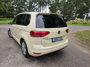 Yellow Volkswagen Touran 2017 in Prienai, with an engine capacity of 2.00 L and mileage of 296 thousand km for 6099 €, photo 5 on AUTOMOTO.COM.LV