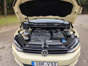 Yellow Volkswagen Touran 2017 in Prienai, with an engine capacity of 2.00 L and mileage of 296 thousand km for 6099 €, photo 16 on AUTOMOTO.COM.LV