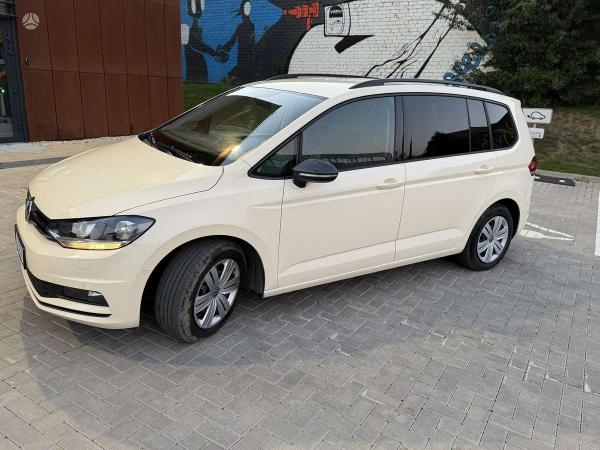 Yellow Volkswagen Touran 2019 in Klaipeda, with an engine capacity of 1.97 L and mileage of 257 thousand km for 8600 €, photo 1 on AUTOMOTO.COM.LV