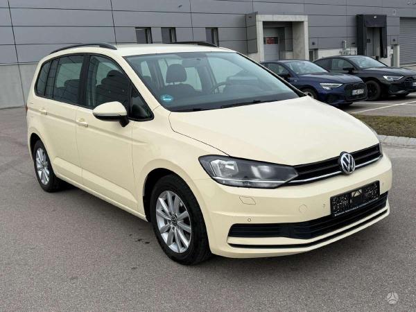 Yellow Volkswagen Touran 2021 in Kaunas, with an engine capacity of 1.97 L and mileage of 245 thousand km for 9999 €, photo 2 on AUTOMOTO.COM.LV