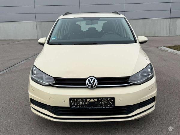 Yellow Volkswagen Touran 2021 in Kaunas, with an engine capacity of 1.97 L and mileage of 245 thousand km for 9999 €, photo 3 on AUTOMOTO.COM.LV