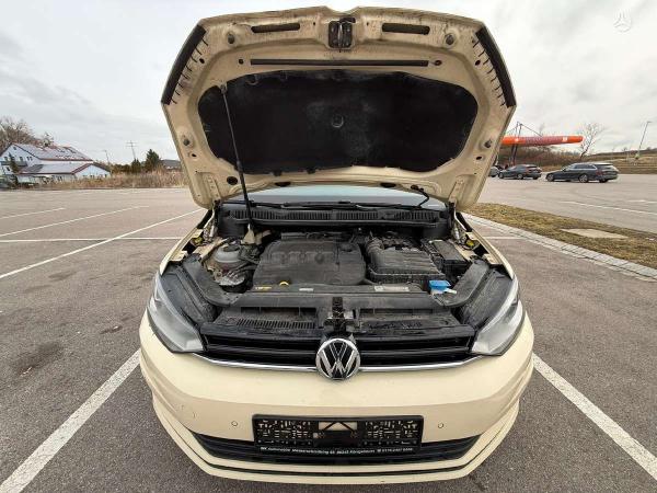 Yellow Volkswagen Touran 2021 in Kaunas, with an engine capacity of 1.97 L and mileage of 245 thousand km for 9999 €, photo 9 on AUTOMOTO.COM.LV