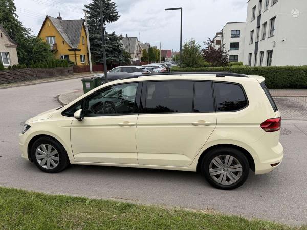 Yellow Volkswagen Touran 2021 in Kaunas, with an engine capacity of 1.97 L and mileage of 240 thousand km for 7700 €, photo 8 on AUTOMOTO.COM.LV