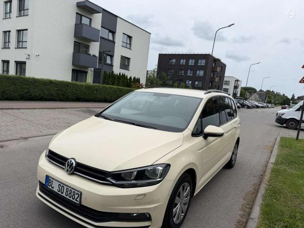 Yellow Volkswagen Touran 2021 in Kaunas, with an engine capacity of 1.97 L and mileage of 240 thousand km for 7700 €, photo 9 on AUTOMOTO.COM.LV