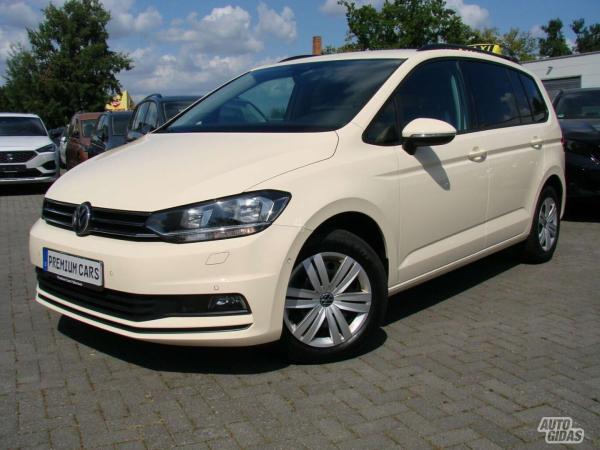 Yellow Volkswagen Touran 2023 in Kaunas, with an engine capacity of 2.00 L and mileage of 89 thousand km for 27961 €, photo 2 on AUTOMOTO.COM.LV