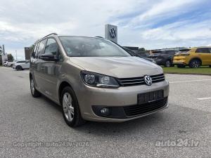 Yellow Volkswagen Touran 2012 in Viljandi, with an engine capacity of 1.20 L and mileage of 161 thousand km for 6990 €, photo 3 on AUTOMOTO.COM.LV