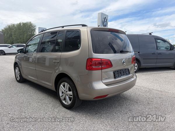 Dzeltens Volkswagen Touran 2012 Viljandi, ar dzinēja tilpumu 1.20 L un nobraukumu 161 tūkst. km par 6990 €, foto 3 vietnē AUTOMOTO.COM.LV