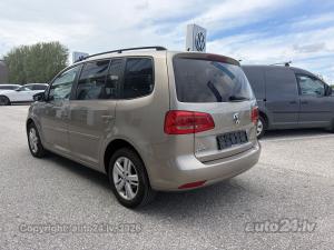 Yellow Volkswagen Touran 2012 in Viljandi, with an engine capacity of 1.20 L and mileage of 161 thousand km for 6990 €, photo 4 on AUTOMOTO.COM.LV