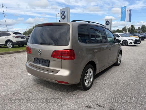 Dzeltens Volkswagen Touran 2012 Viljandi, ar dzinēja tilpumu 1.20 L un nobraukumu 161 tūkst. km par 6990 €, foto 4 vietnē AUTOMOTO.COM.LV