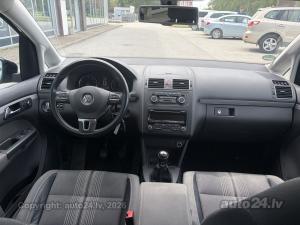 Yellow Volkswagen Touran 2012 in Viljandi, with an engine capacity of 1.20 L and mileage of 161 thousand km for 6990 €, photo 6 on AUTOMOTO.COM.LV