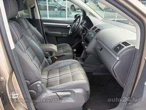 Yellow Volkswagen Touran 2012 in Viljandi, with an engine capacity of 1.20 L and mileage of 161 thousand km for 6990 €, photo 8 on AUTOMOTO.COM.LV