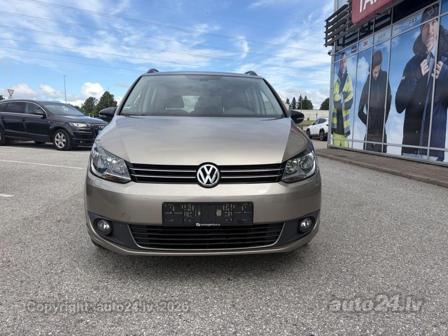 Yellow Volkswagen Touran 2012 in Viljandi, with an engine capacity of 1.20 L and mileage of 161 thousand km for 6990 €, photo 16 on AUTOMOTO.COM.LV