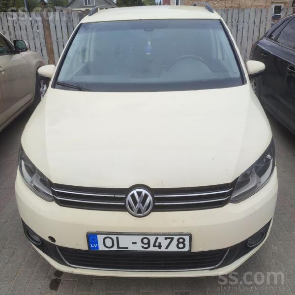 Yellow Volkswagen Touran 2015 in Liepaja, with an engine capacity of 2.00 L and mileage of 0 thousand km for 2100 €, photo 3 on AUTOMOTO.COM.LV