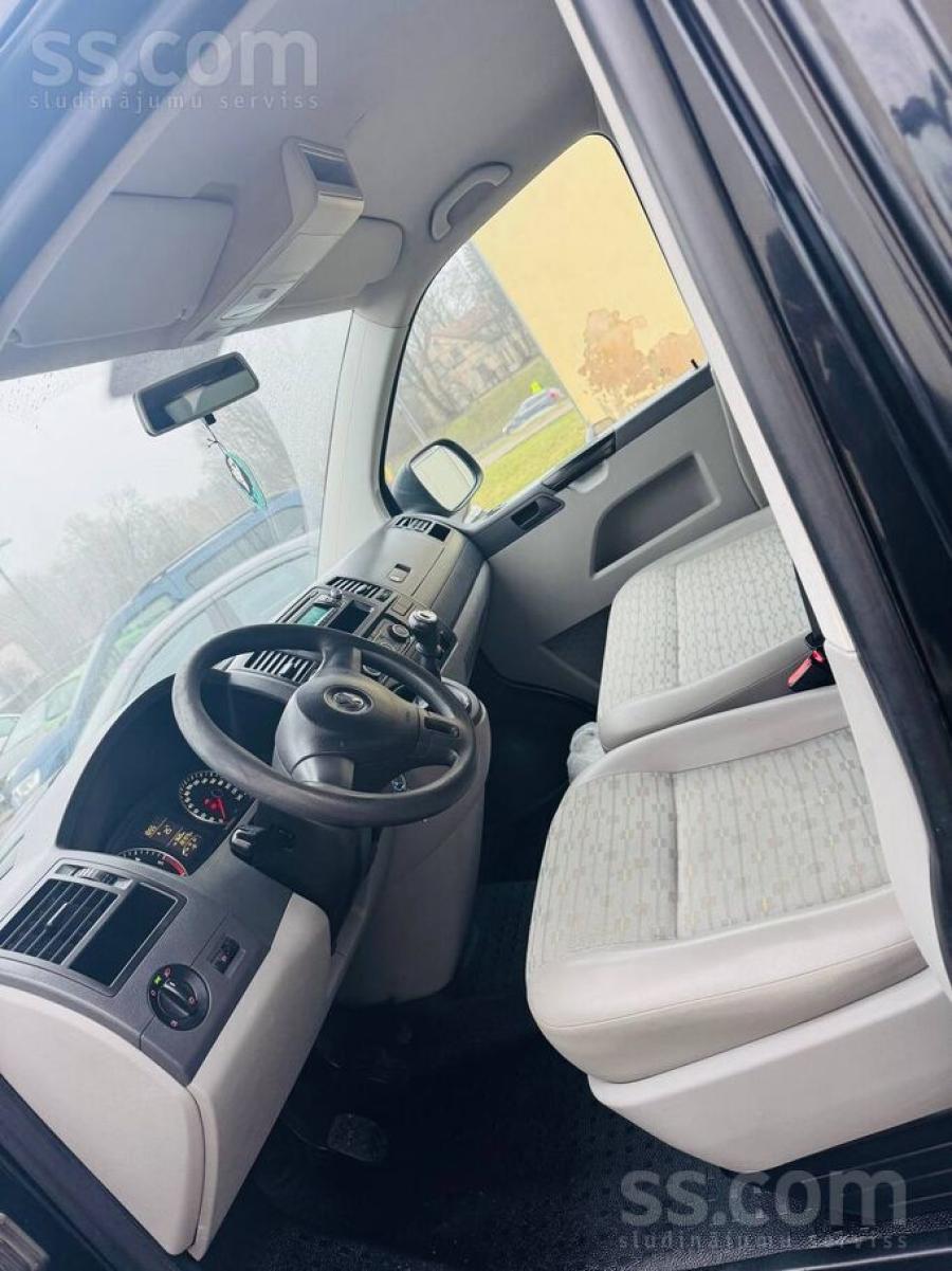 Black Volkswagen Transporter 2012 in Riga, with an engine capacity of 2.00 L and mileage of 280 thousand km for 8300 €, photo 9 on AUTOMOTO.COM.LV