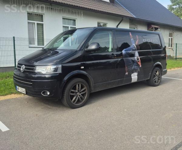 Black Volkswagen Transporter 2014 in Riga, with an engine capacity of 2.00 L and mileage of 242 thousand km for 7500 €, photo 4 on AUTOMOTO.COM.LV
