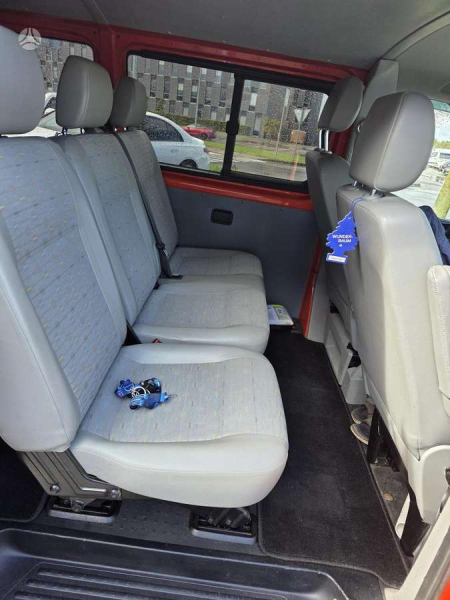 Orange Volkswagen Transporter 2013 in Kaunas, with an engine capacity of 2.00 L and mileage of 340 thousand km for 12705 €, photo 9 on AUTOMOTO.COM.LV