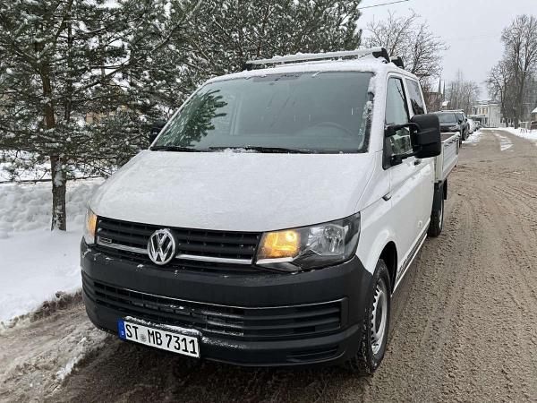 White Volkswagen Transporter 2017 in Siauliai, with an engine capacity of 2.00 L and mileage of 260 thousand km for 13999 €, photo 3 on AUTOMOTO.COM.LV