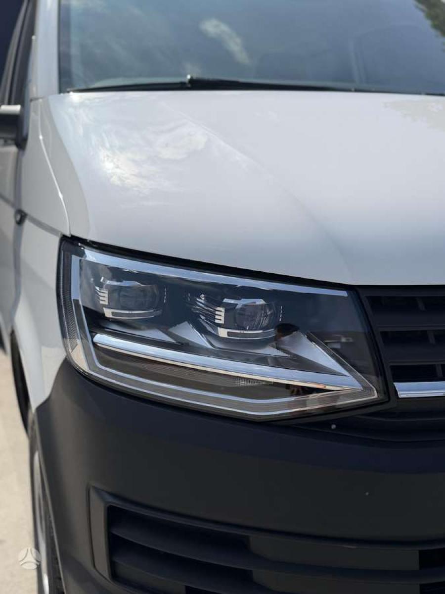 White Volkswagen Transporter 2017 in Kaunas, with an engine capacity of 1.97 L and mileage of 62 thousand km for 16850 €, photo 4 on AUTOMOTO.COM.LV