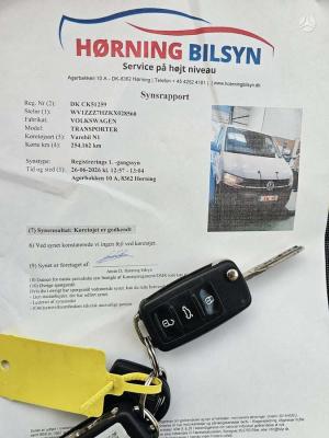 White Volkswagen Transporter 2019 in Pakruojis, with an engine capacity of 2.00 L and mileage of 254 thousand km for 9300 €, photo 14 on AUTOMOTO.COM.LV