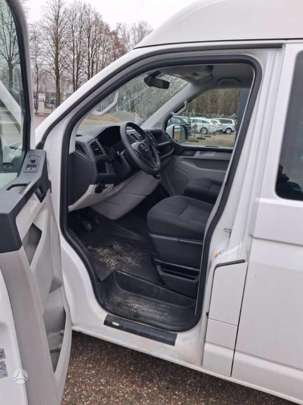 White Volkswagen Transporter 2020 in Rokiskis, with an engine capacity of 2.00 L and mileage of 311 thousand km for 11800 €, photo 9 on AUTOMOTO.COM.LV