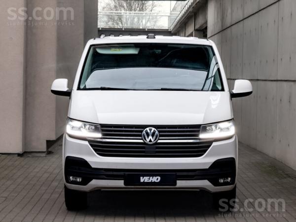 White Volkswagen Transporter 2023 in Riga, with an engine capacity of 2.00 L and mileage of 126 thousand km for 29900 €, photo 2 on AUTOMOTO.COM.LV
