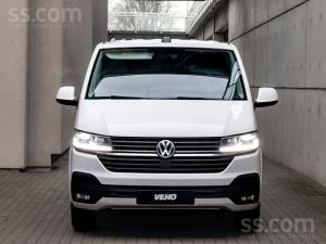 White Volkswagen Transporter 2023 in Riga, with an engine capacity of 2.00 L and mileage of 126 thousand km for 29900 €, photo 2 on AUTOMOTO.COM.LV