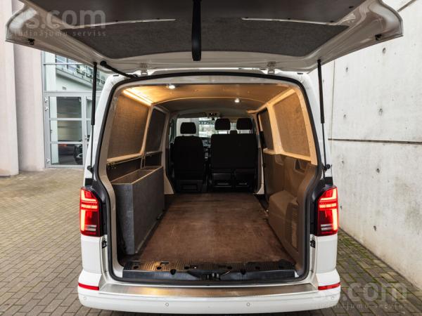 White Volkswagen Transporter 2023 in Riga, with an engine capacity of 2.00 L and mileage of 126 thousand km for 29900 €, photo 9 on AUTOMOTO.COM.LV