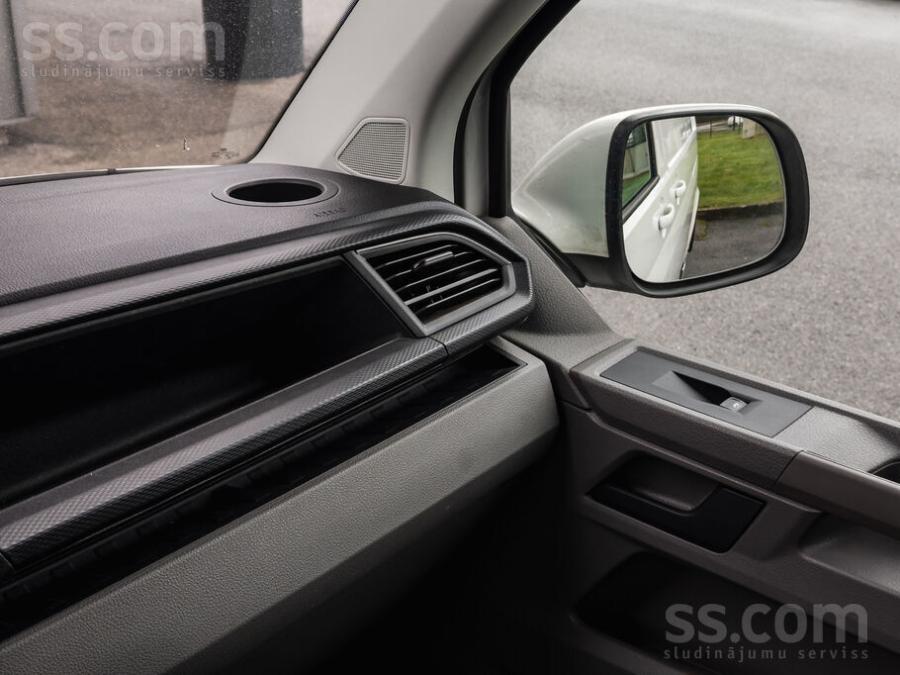 White Volkswagen Transporter 2023 in Riga, with an engine capacity of 2.00 L and mileage of 126 thousand km for 29900 €, photo 17 on AUTOMOTO.COM.LV