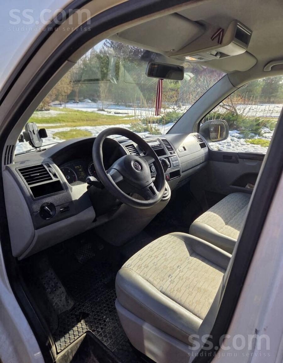 White Volkswagen Transporter 2011 in Riga, with an engine capacity of 2.00 L and mileage of 244 thousand km for 6250 €, photo 11 on AUTOMOTO.COM.LV