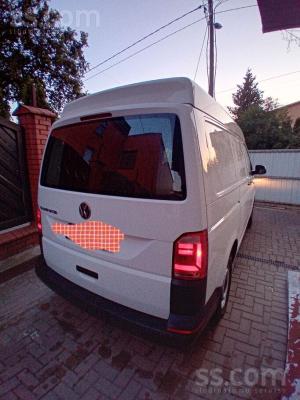 White Volkswagen Transporter 2019 in Riga, with an engine capacity of 2.00 L and mileage of 198 thousand km for 11999 €, photo 4 on AUTOMOTO.COM.LV