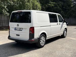White Volkswagen Transporter 2021 in Riga, with an engine capacity of 2.00 L and mileage of 220 thousand km for 20900 €, photo 6 on AUTOMOTO.COM.LV