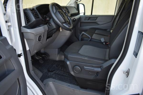 White Volkswagen Transporter 2021 in Talsi, with an engine capacity of 2.00 L and mileage of 230 thousand km for 18500 €, photo 6 on AUTOMOTO.COM.LV