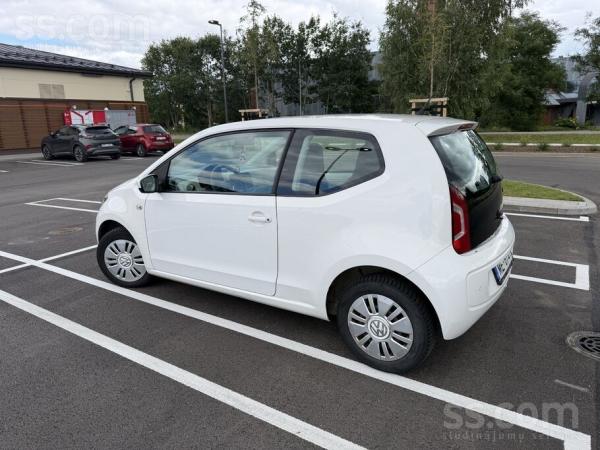 White Volkswagen Up 2012 in Riga, with an engine capacity of 1.00 L and mileage of 206 thousand km for 3650 €, photo 5 on AUTOMOTO.COM.LV