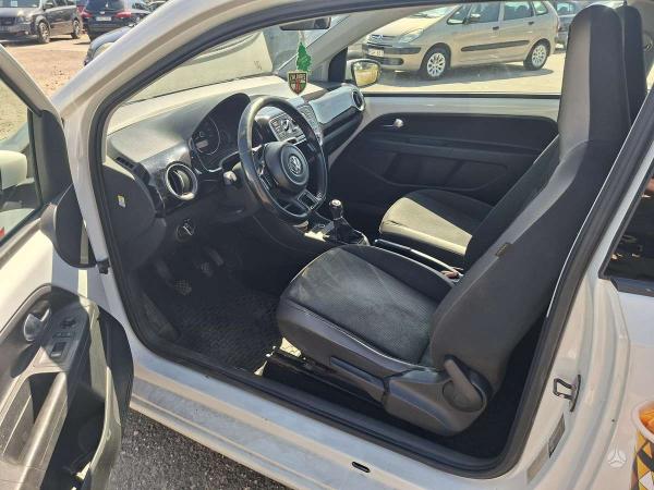 White Volkswagen Up 2011 in Plunge, with an engine capacity of 1.00 L and mileage of 233 thousand km for 1950 €, photo 5 on AUTOMOTO.COM.LV