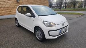 White Volkswagen Up 2014 in Riga, with an engine capacity of 1.00 L and mileage of 150 thousand km for 3850 €, photo 4 on AUTOMOTO.COM.LV
