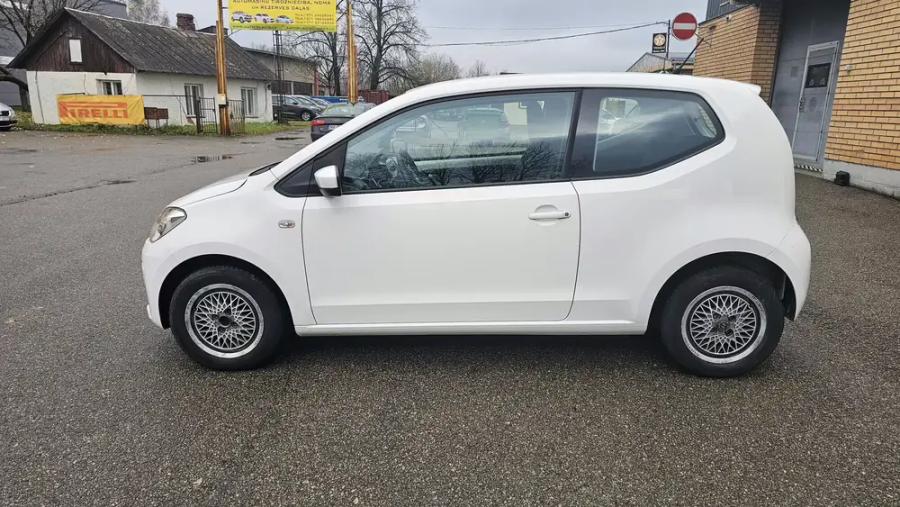 White Volkswagen Up 2014 in Riga, with an engine capacity of 1.00 L and mileage of 150 thousand km for 3850 €, photo 9 on AUTOMOTO.COM.LV