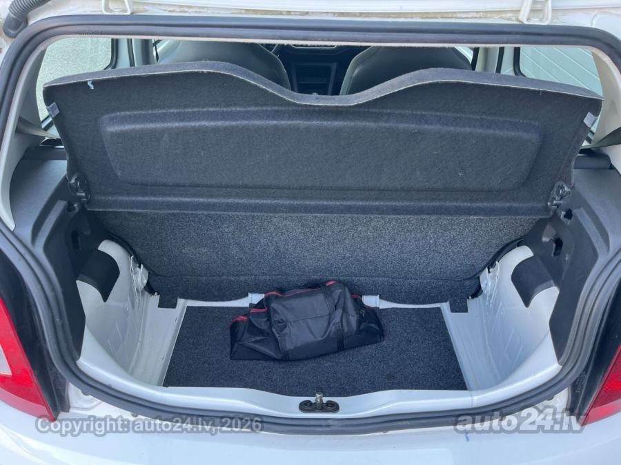 White Volkswagen Up 2014 in Kuressaare, with an engine capacity of 1.00 L and mileage of 79 thousand km for 4950 €, photo 14 on AUTOMOTO.COM.LV