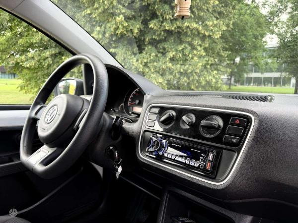 White Volkswagen Up 2015 in Kaunas, with an engine capacity of 1.00 L and mileage of 145 thousand km for 2690 €, photo 5 on AUTOMOTO.COM.LV