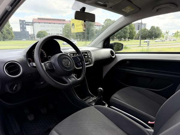 White Volkswagen Up 2015 in Kaunas, with an engine capacity of 1.00 L and mileage of 145 thousand km for 2690 €, photo 6 on AUTOMOTO.COM.LV