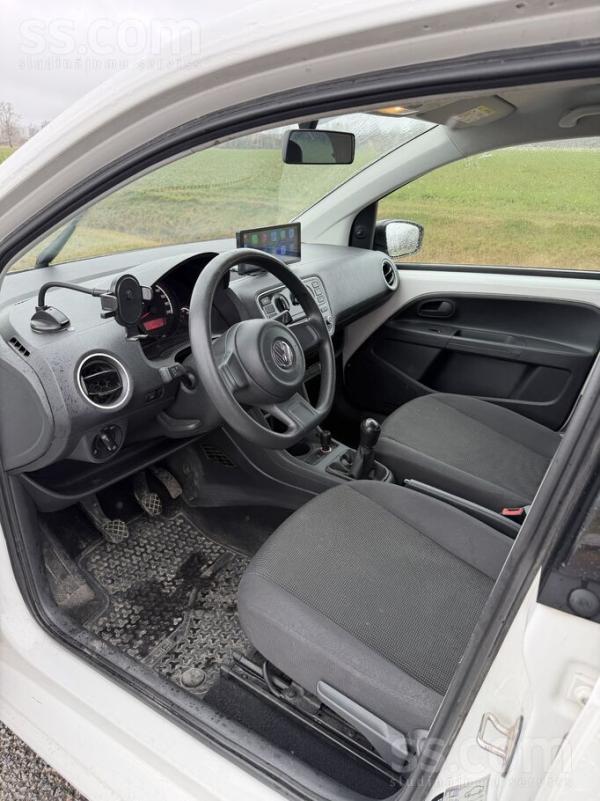 White Volkswagen Up 2016 in Riga, with an engine capacity of 1.00 L and mileage of 178 thousand km for 4800 €, photo 7 on AUTOMOTO.COM.LV
