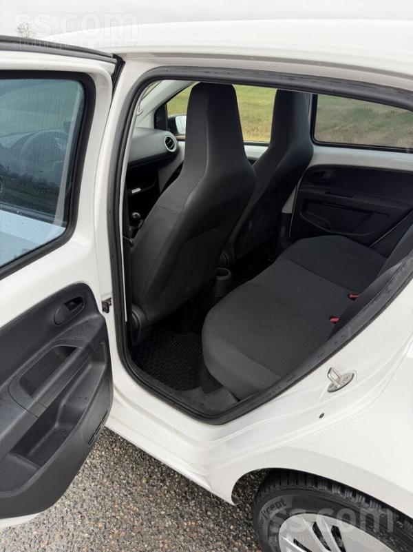 White Volkswagen Up 2016 in Riga, with an engine capacity of 1.00 L and mileage of 178 thousand km for 4800 €, photo 8 on AUTOMOTO.COM.LV