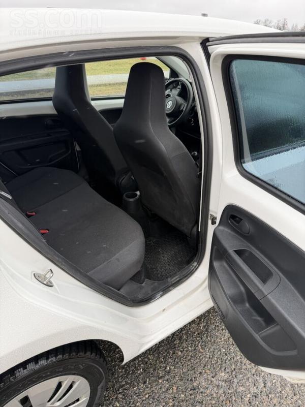 White Volkswagen Up 2016 in Riga, with an engine capacity of 1.00 L and mileage of 178 thousand km for 4800 €, photo 10 on AUTOMOTO.COM.LV