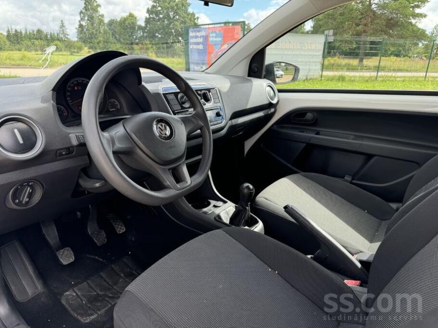 White Volkswagen Up 2017 in Valmiera, with an engine capacity of 1.00 L and mileage of 203 thousand km for 4650 €, photo 8 on AUTOMOTO.COM.LV