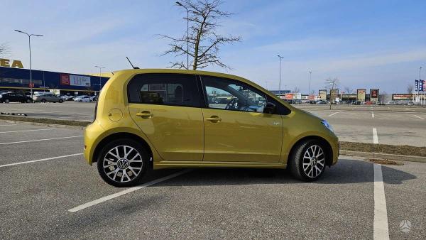 Yellow Volkswagen Up 2020 in Vilnius, with an engine capacity of 0.00 L and mileage of 46 thousand km for 10999 €, photo 3 on AUTOMOTO.COM.LV
