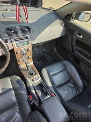 Black Volvo C70 2008 in Riga, with an engine capacity of 2.40 L and mileage of 280 thousand km for 5600 €, photo 12 on AUTOMOTO.COM.LV