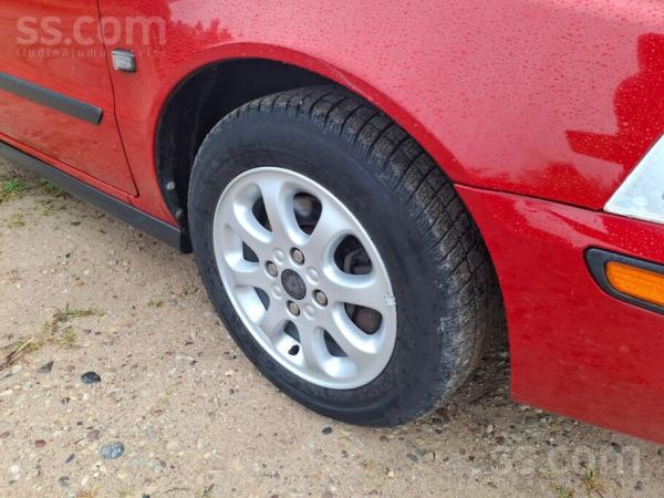 Red Volvo S40 2002 in Tukums, with an engine capacity of 1.80 L and mileage of 193 thousand km for 1790 €, photo 9 on AUTOMOTO.COM.LV