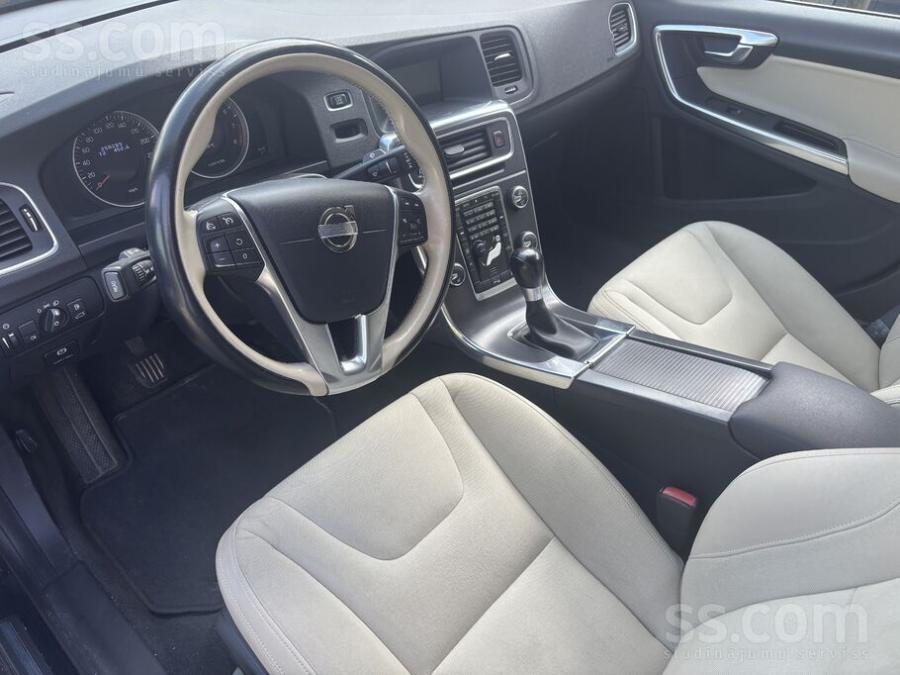 Black Volvo S60 2011 in Riga, with an engine capacity of 1.60 L and mileage of 250 thousand km for 5800 €, photo 12 on AUTOMOTO.COM.LV