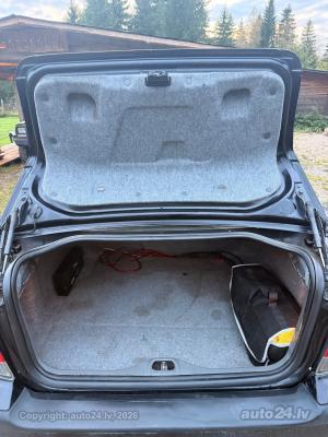 Black Volvo S60 2002 in Tallinn, with an engine capacity of 2.40 L and mileage of 280 thousand km for 1800 €, photo 18 on AUTOMOTO.COM.LV
