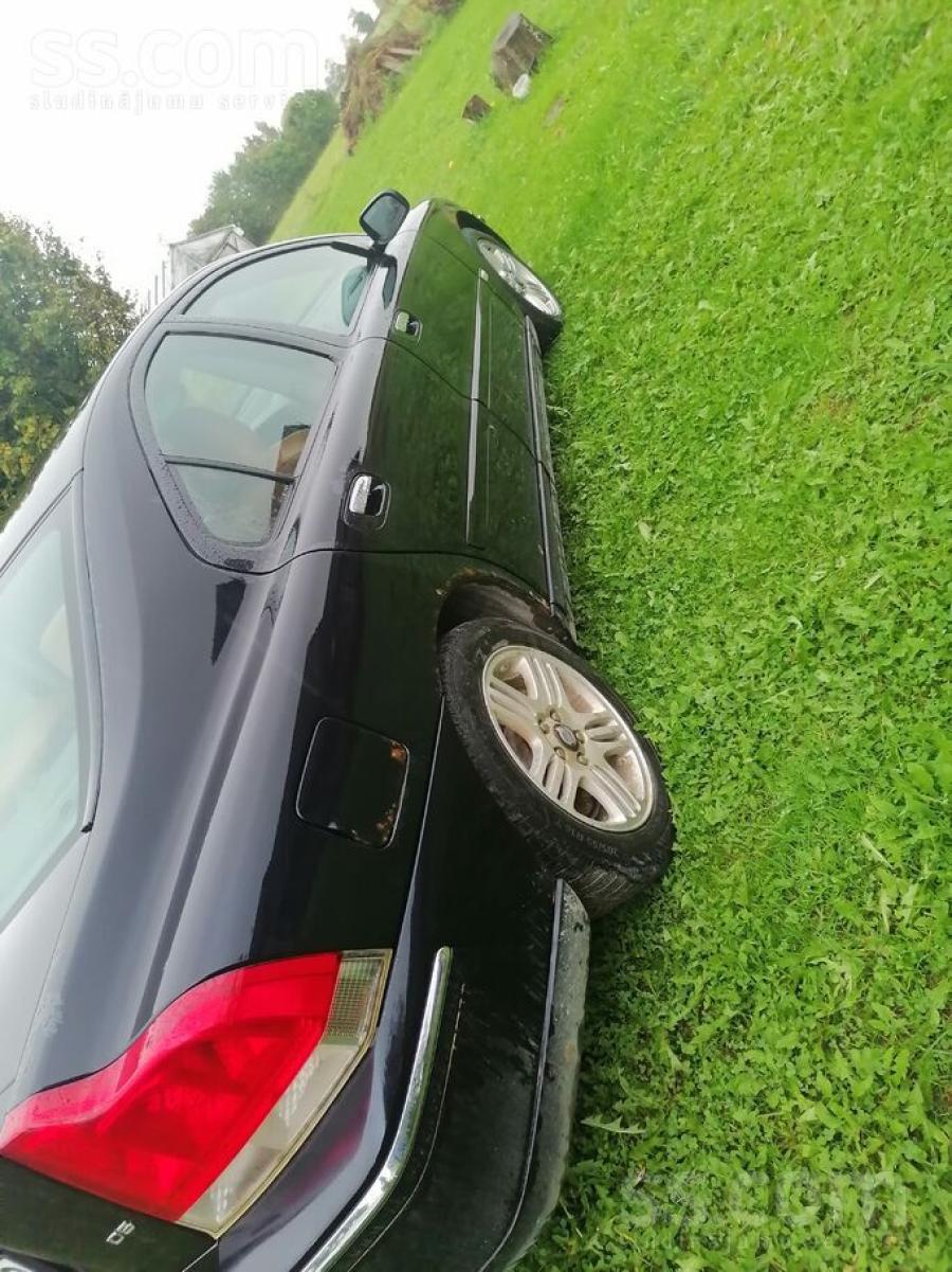 Black Volvo S60 2005 in Valmiera, with an engine capacity of 2.40 L and mileage of 354 thousand km for 900 €, photo 13 on AUTOMOTO.COM.LV